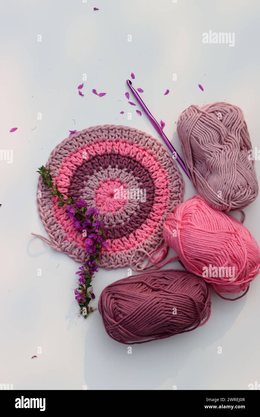 Crochet hobby concept. Handmade decorative ornament made of cotton ...