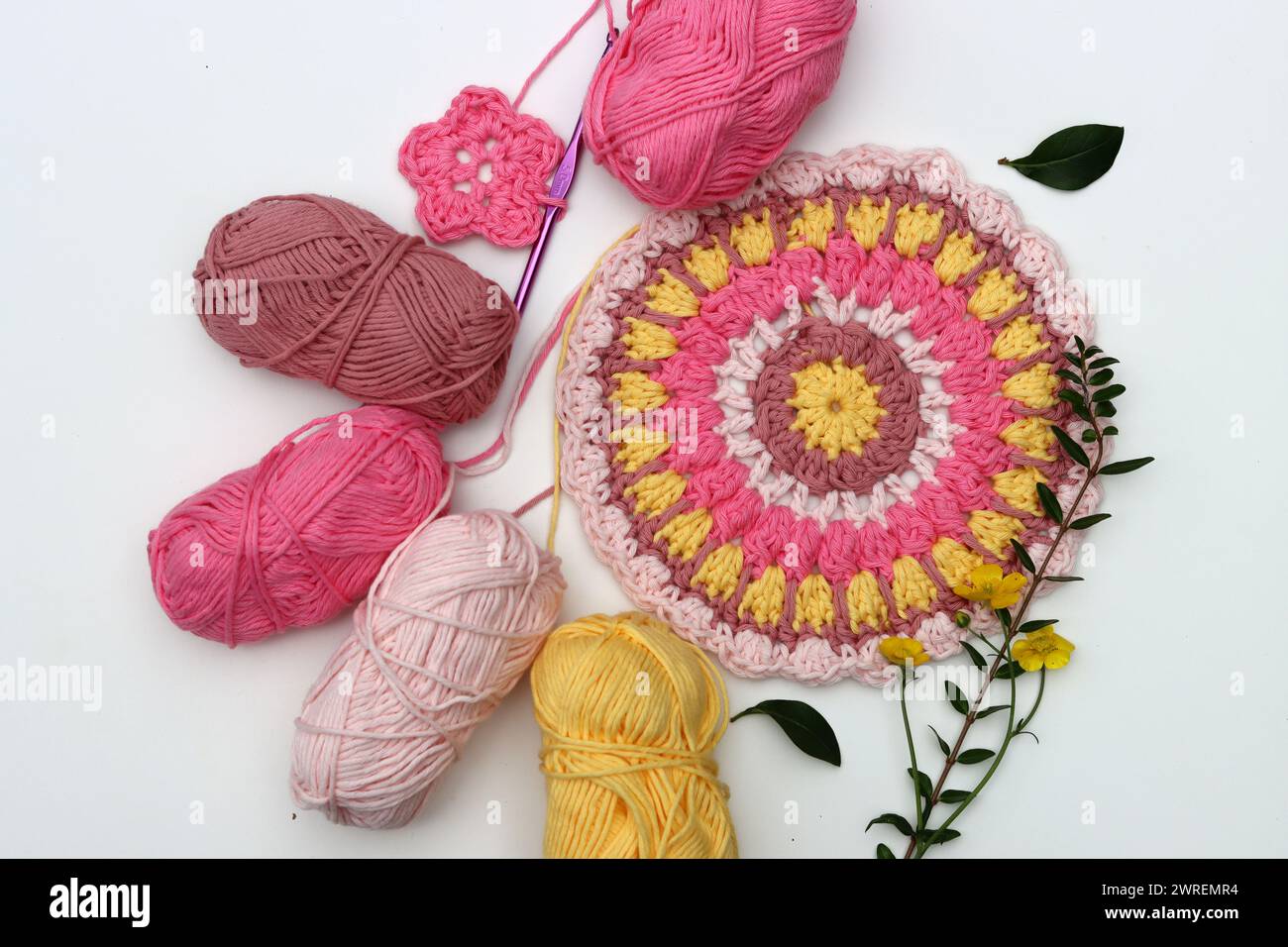 Pink crocheting. Handmade ornament made of organic pink yarn. White ...
