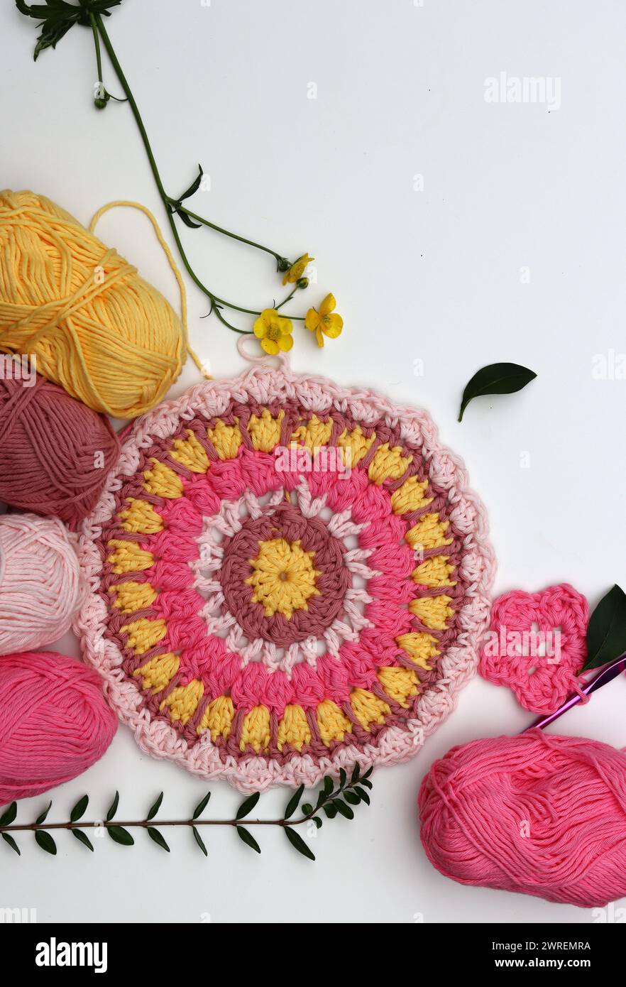 Pink crocheting. Handmade ornament made of organic pink yarn. White ...