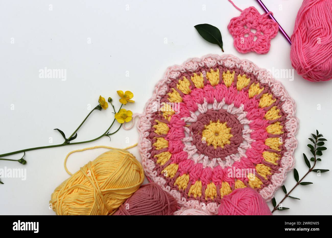 Crochet hobby concept. Handmade decorative ornament made of cotton ...