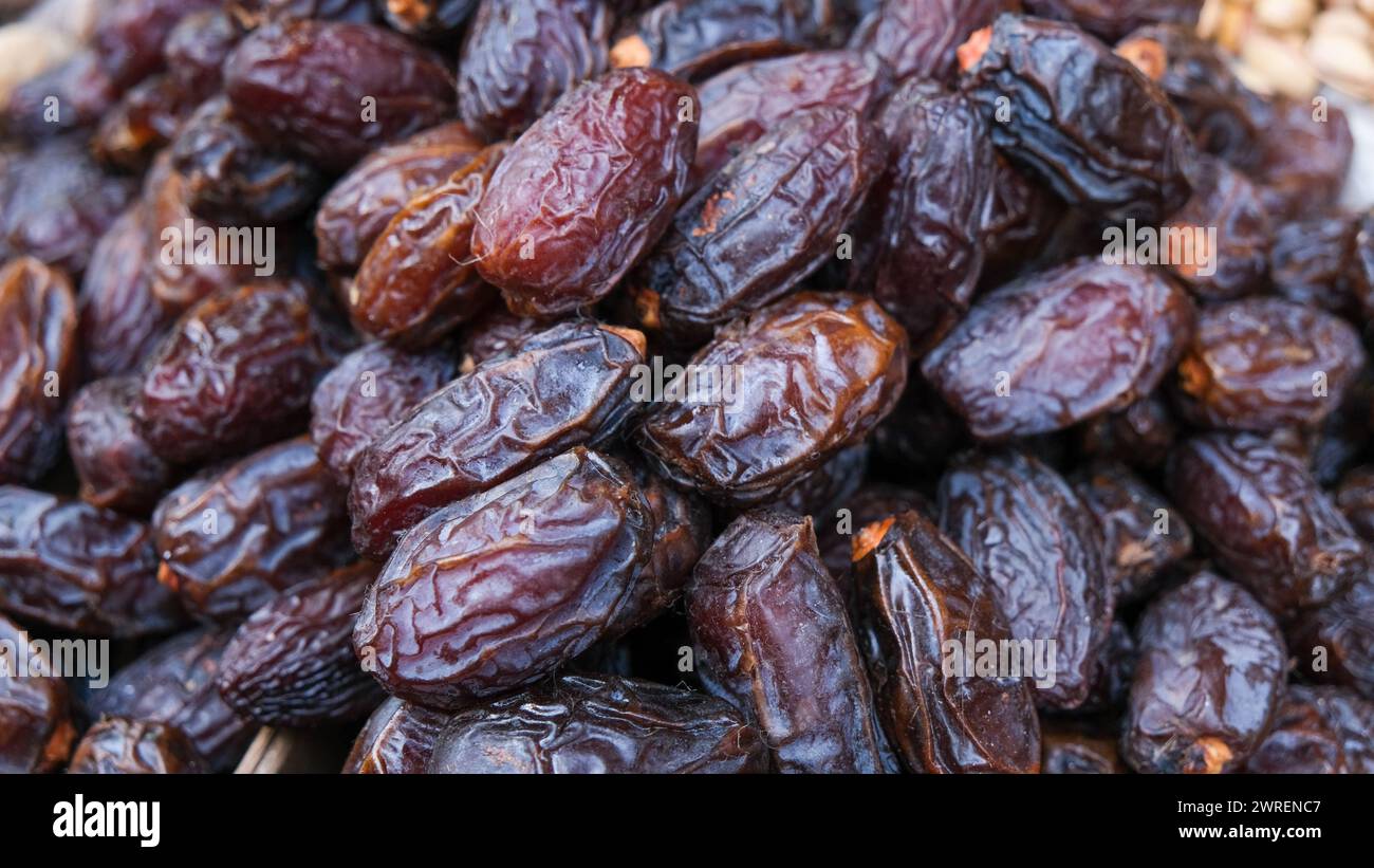 The close up surface texture of dried dates fruits Stock Photo - Alamy