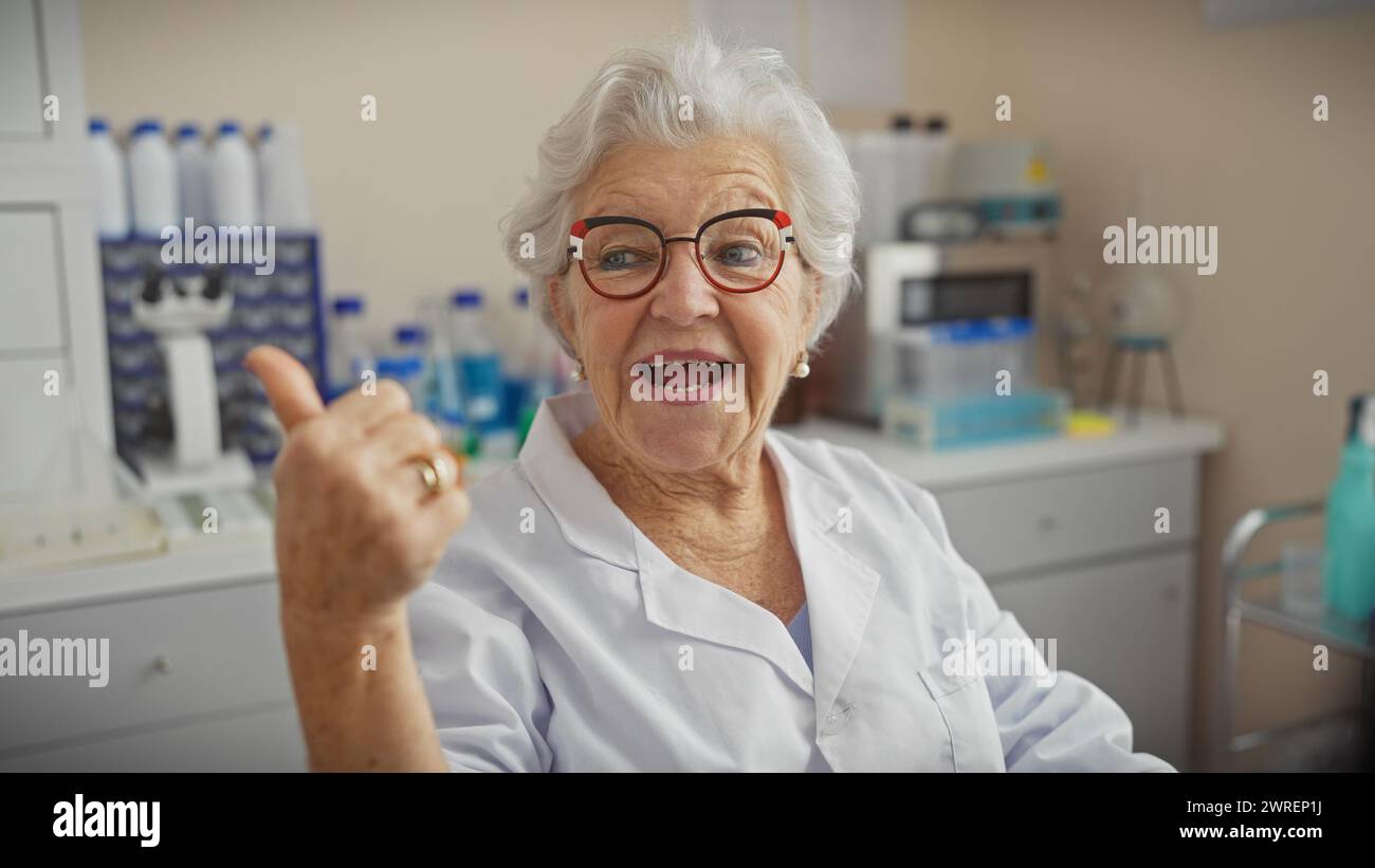 Senior woman gives thumbs up hi-res stock photography and images - Alamy