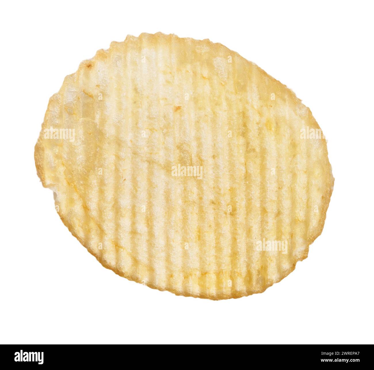 Close-up of a single salty potato chip with visible ridges isolated on ...