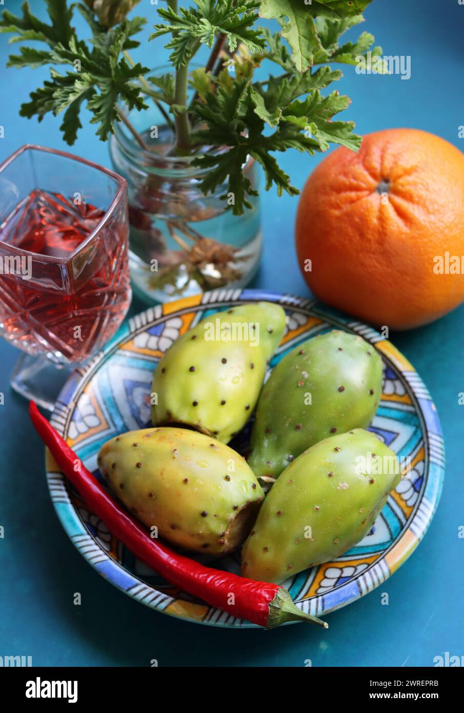 Still life with colorful fruit and spices on a table. Top view photo of ...