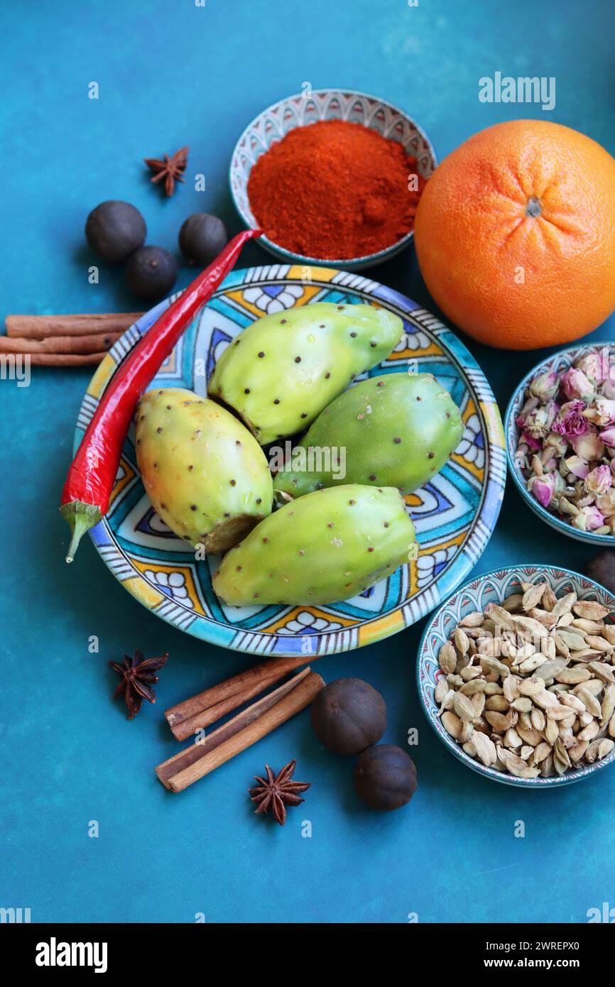 Still life with colorful fruit and spices on a table. Top view photo of ...
