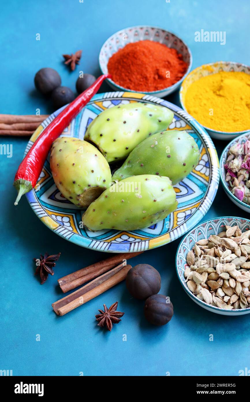 Still life with colorful fruit and spices on a table. Top view photo of ...