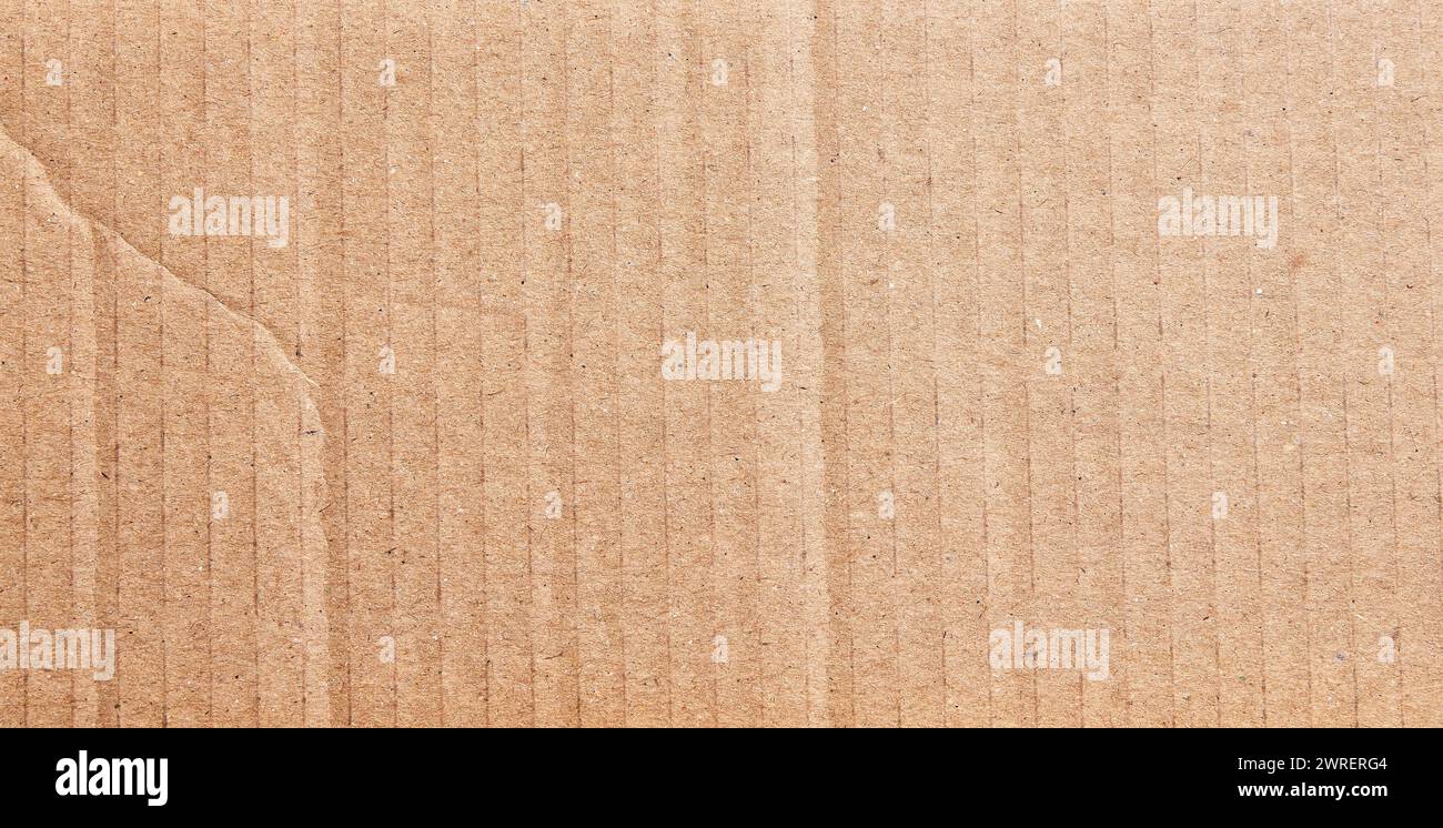 Brown cardboard carton material texture background Stock Photo - Alamy