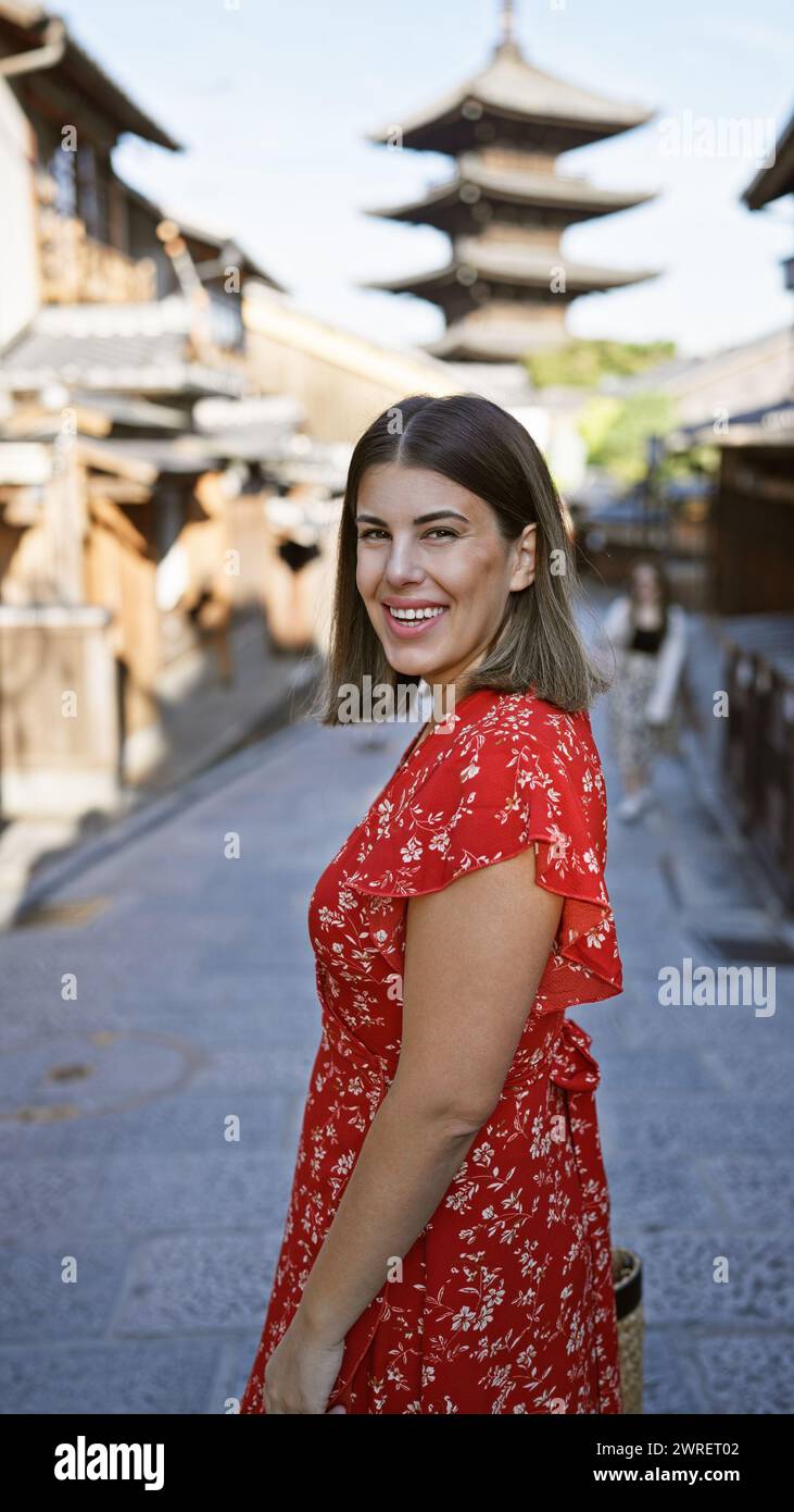 Beautiful hispanic woman smiling joyfully, confidently posing, standing ...