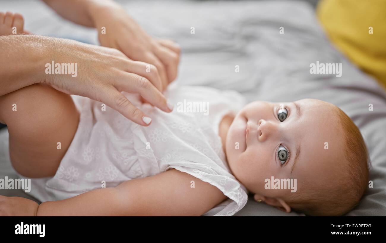 Mother tickles daughter hi-res stock photography and images - Alamy