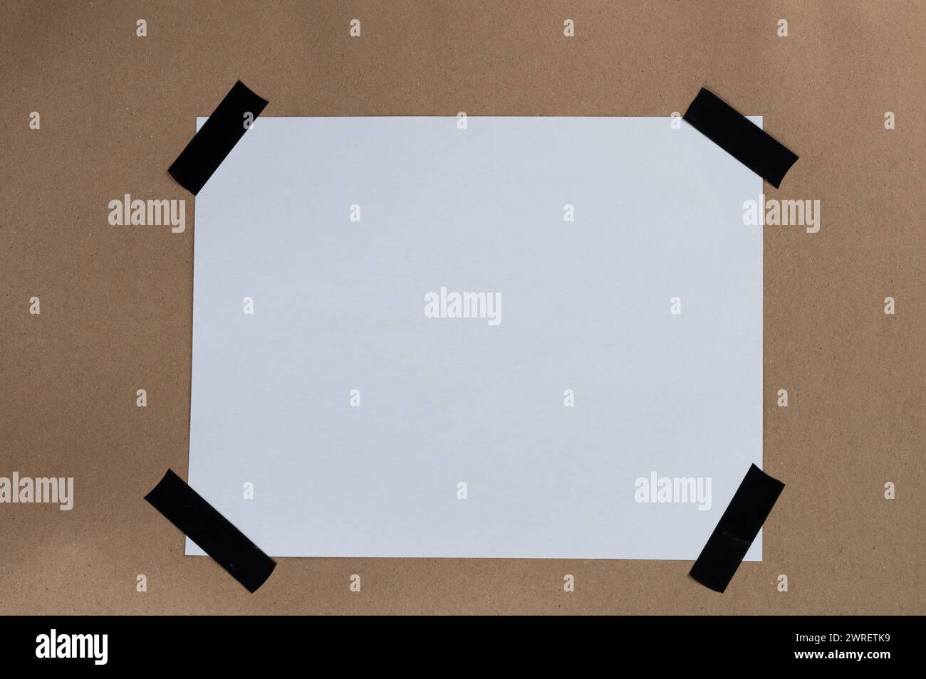 Clean empty white paper join to brown recycled background Stock Photo ...