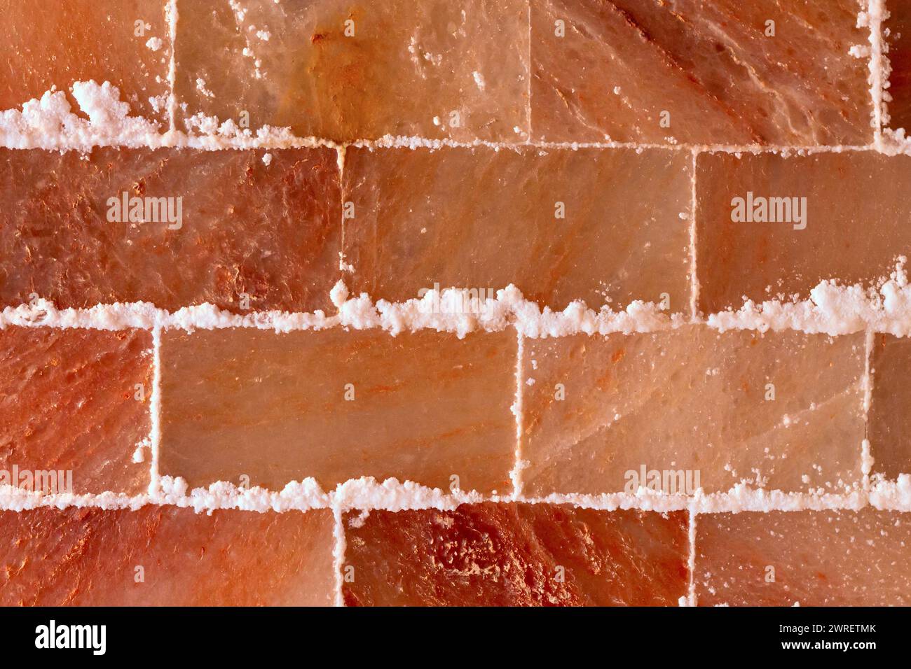 Himalayan pink salt textured wall in spa or sauna room Stock Photo - Alamy