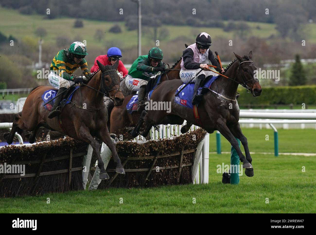 Slade Steel ridden by Rachael Blackmore (right) jumps the last fence on ...