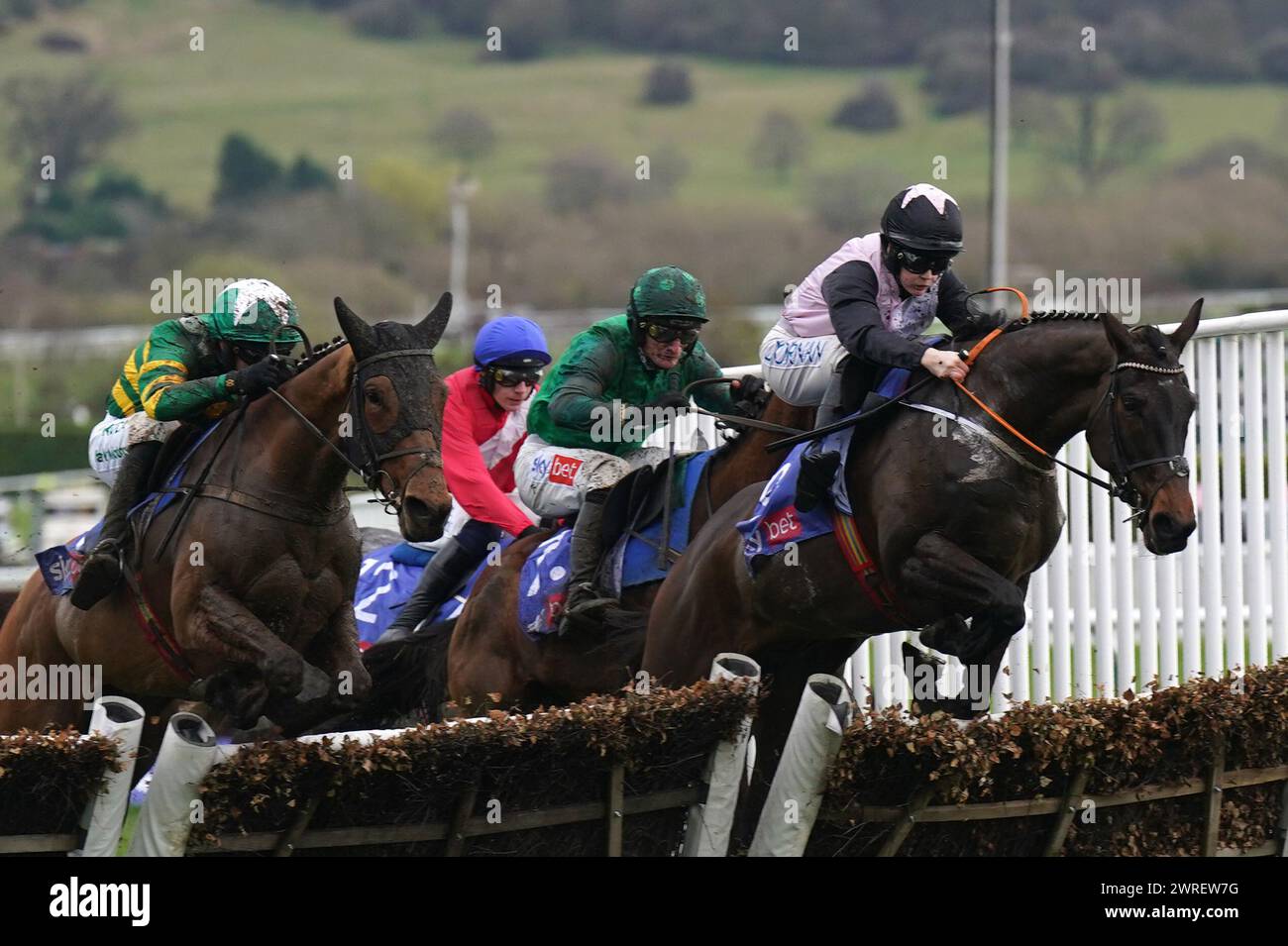 Slade Steel ridden by Rachael Blackmore (right) jumps the last fence on ...