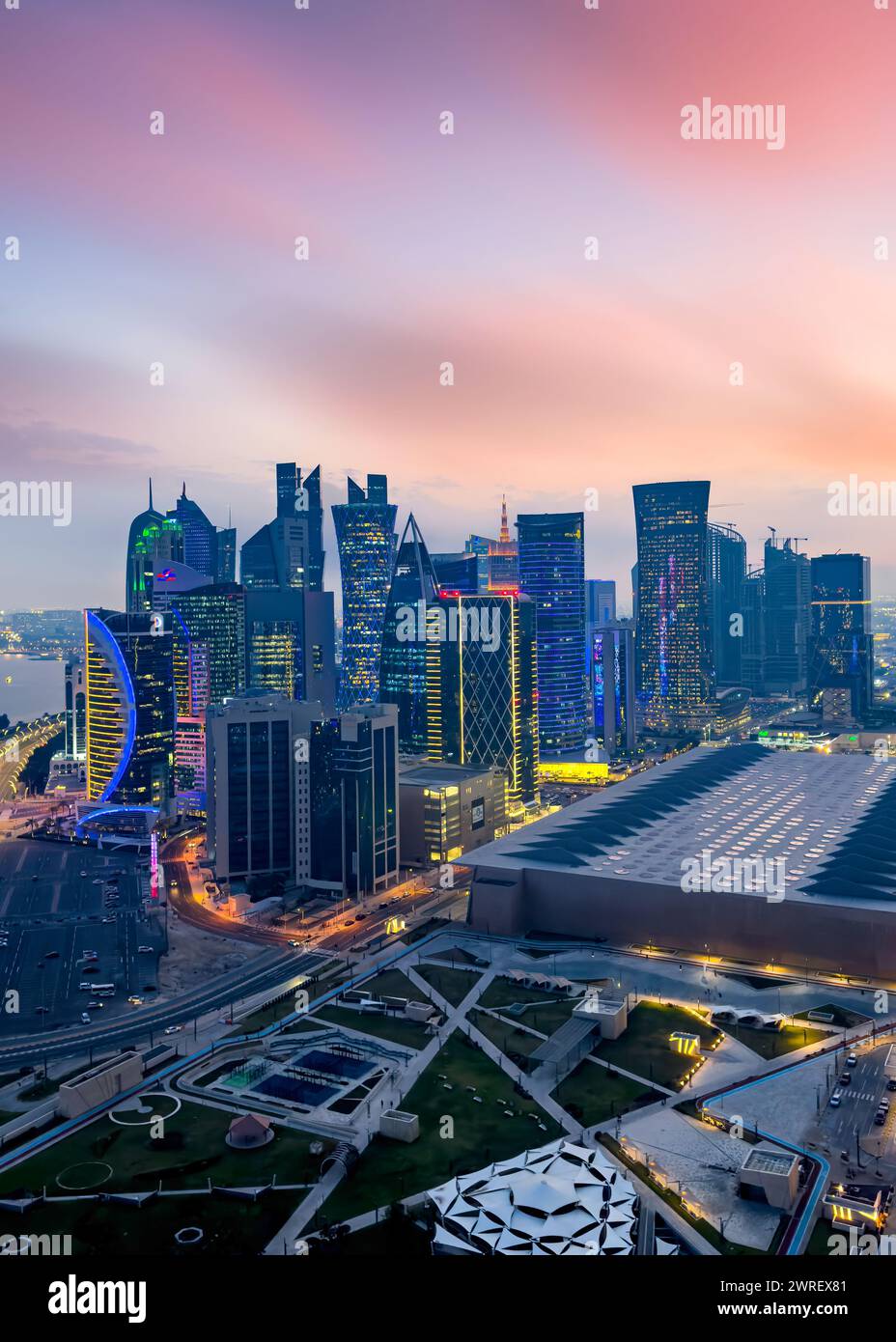 The skyline of Doha, Qatar during sunset Stock Photo - Alamy
