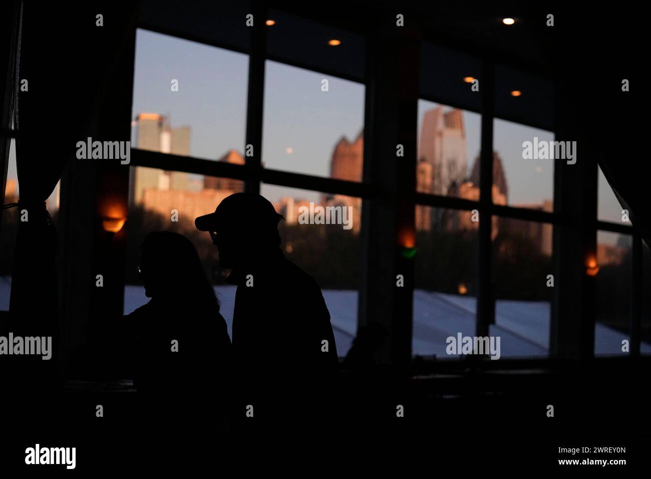 Voters leave a polling site for the presidential primary election on ...