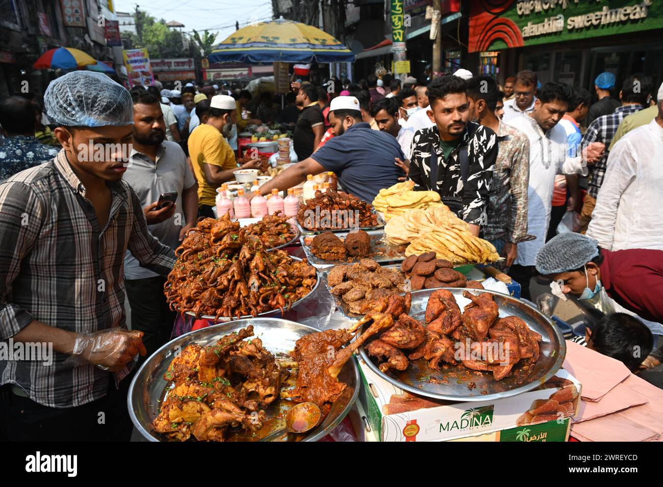 Street vendor sells iftar foods for breaking the daytime fast of holy month of Ramadan at a ...
