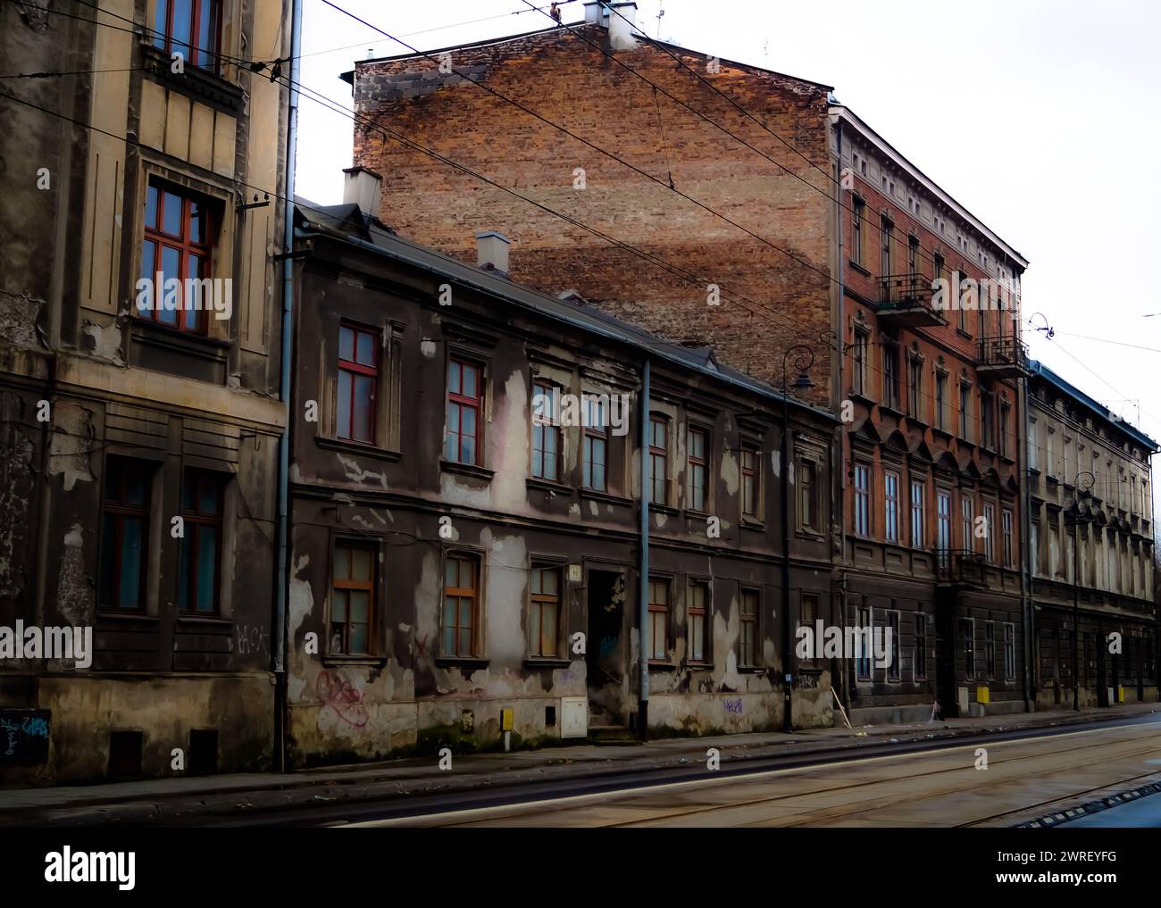 A row of historic buildings with weathered walls Stock Photo - Alamy