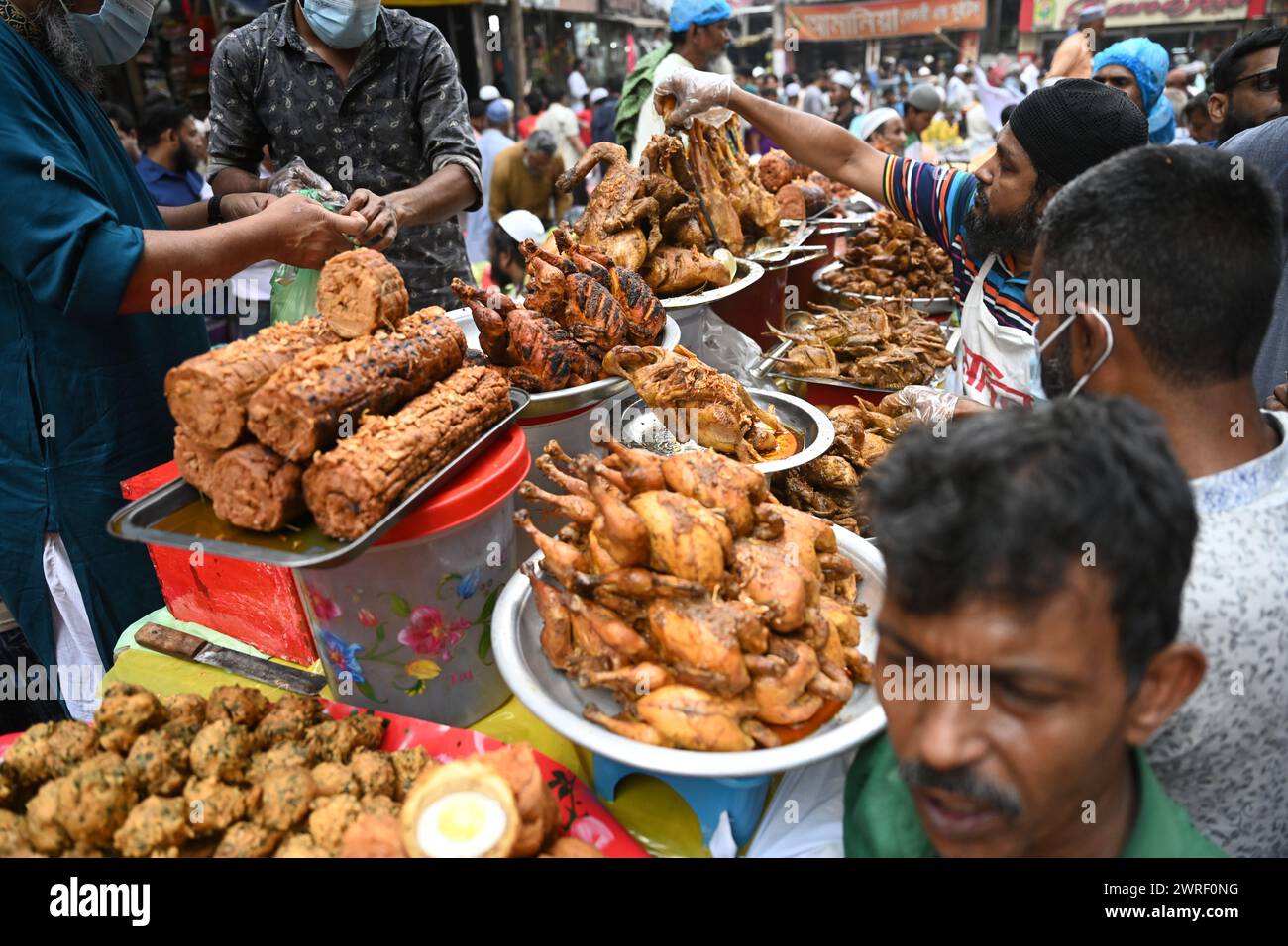 Street vendor sells iftar foods for breaking the daytime fast of holy ...