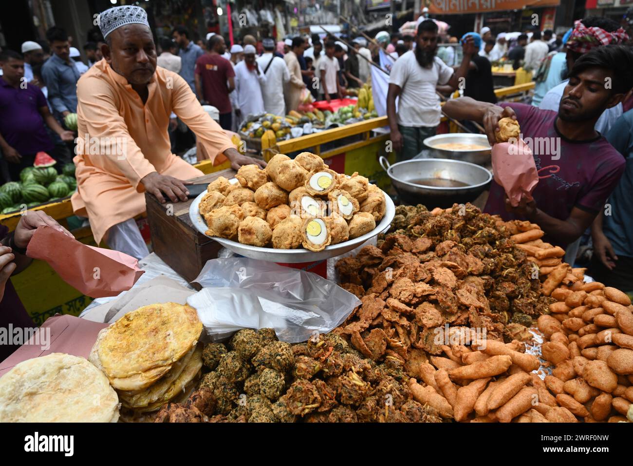 Street vendor sells iftar foods for breaking the daytime fast of holy ...