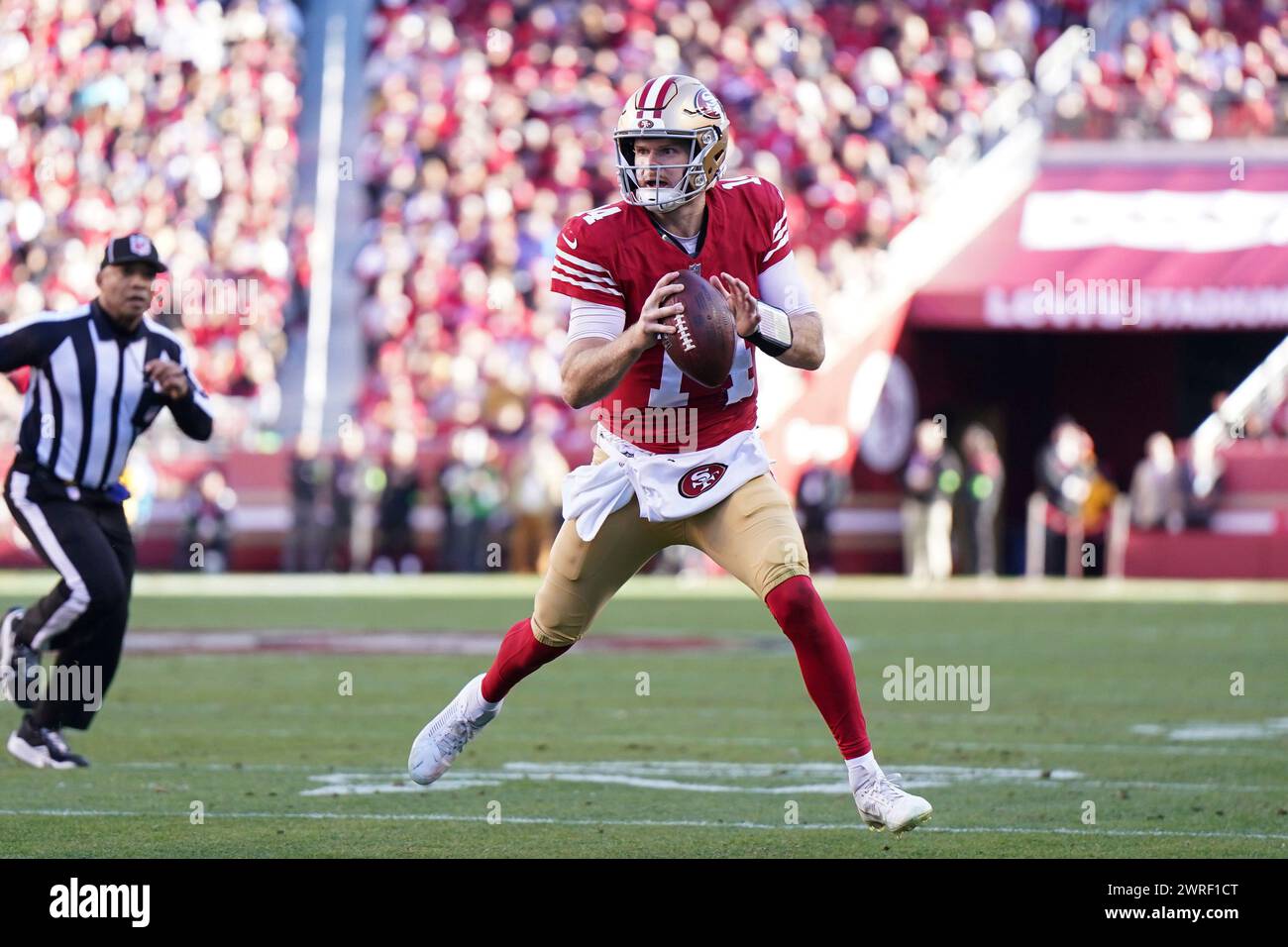 FILE - San Francisco 49ers quarterback Sam Darnold (14) looks to pass ...