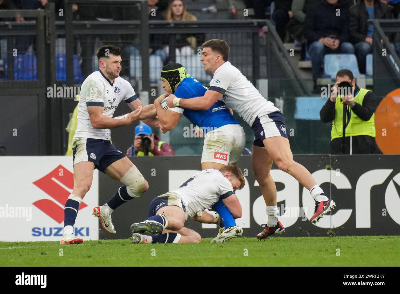 Juan Ignacio Brex of Italy is held by Kyle Steyn of Scotland during the ...
