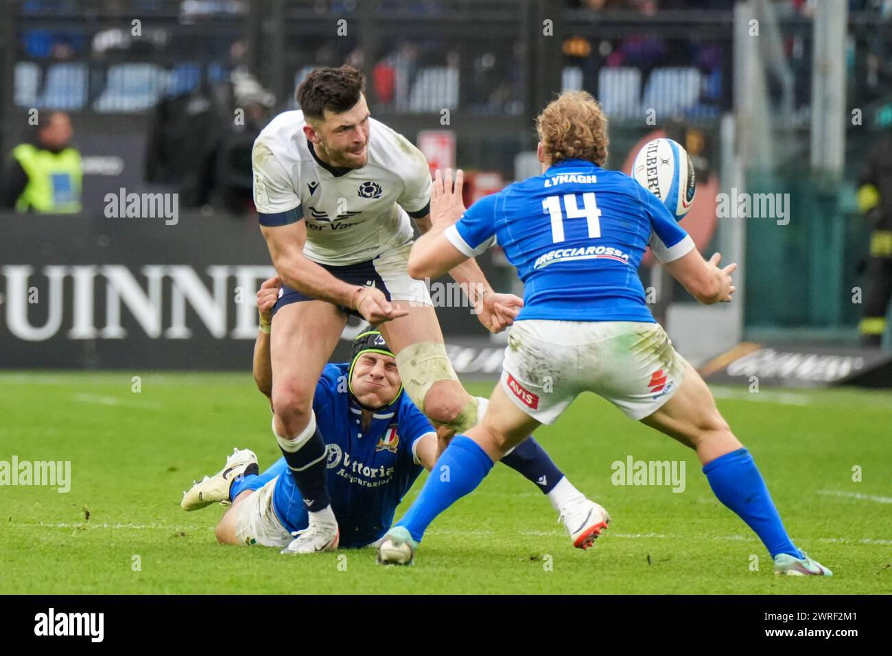 Blair Kinghorn of Scotland is tackled by Louis Lynagh of Italy during ...