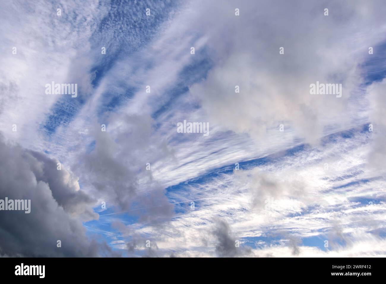 Cirrus clouds and aircraft contrails - central France Stock Photo - Alamy