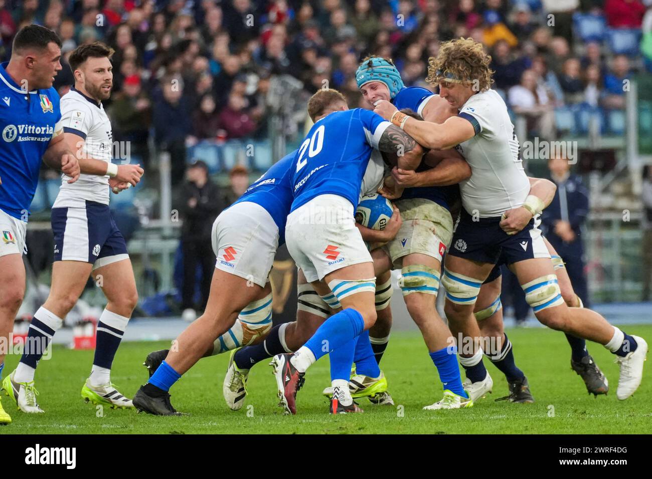Rome, Italy. 09th Mar, 2024. Sam Skinner of Scotland is tackled by ...