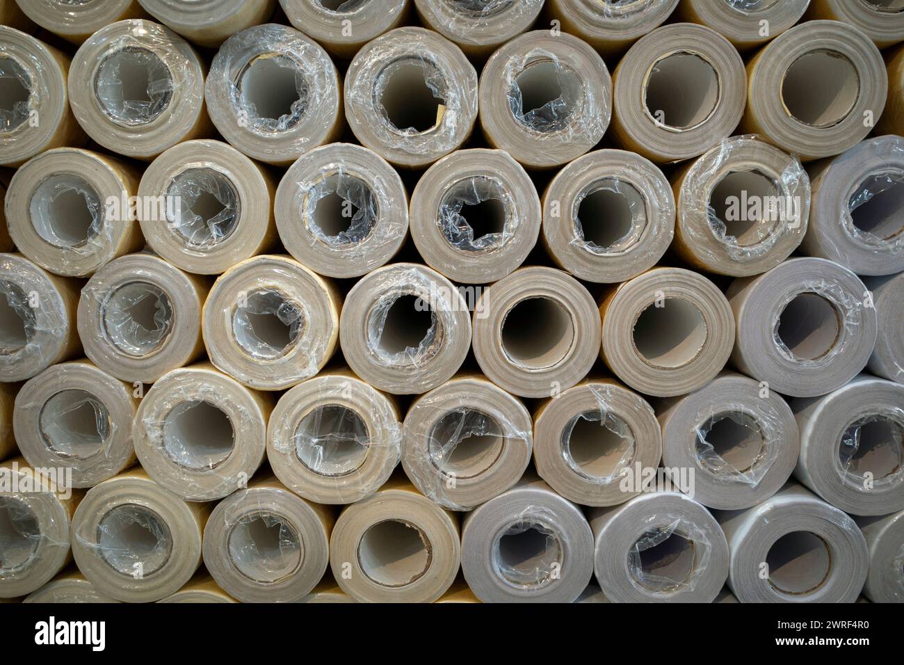 Stacks of rolled up white paper in the supermarket Stock Photo - Alamy
