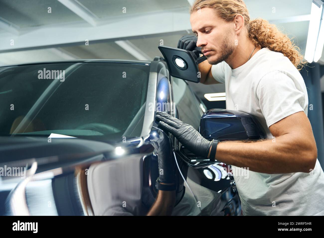 Specialist conducts check inspection hi-res stock photography and ...