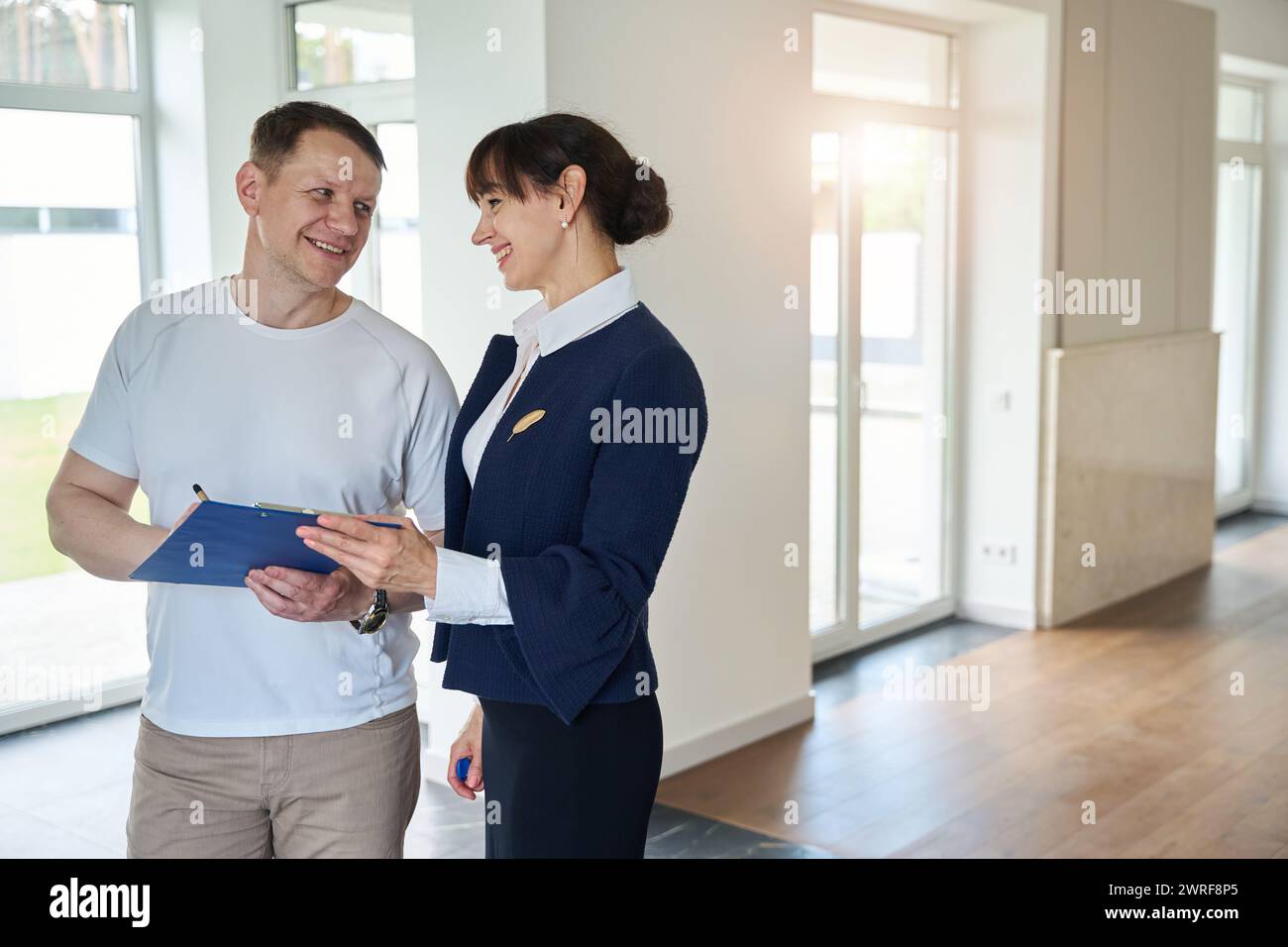 Woman signs documents home hi-res stock photography and images - Alamy