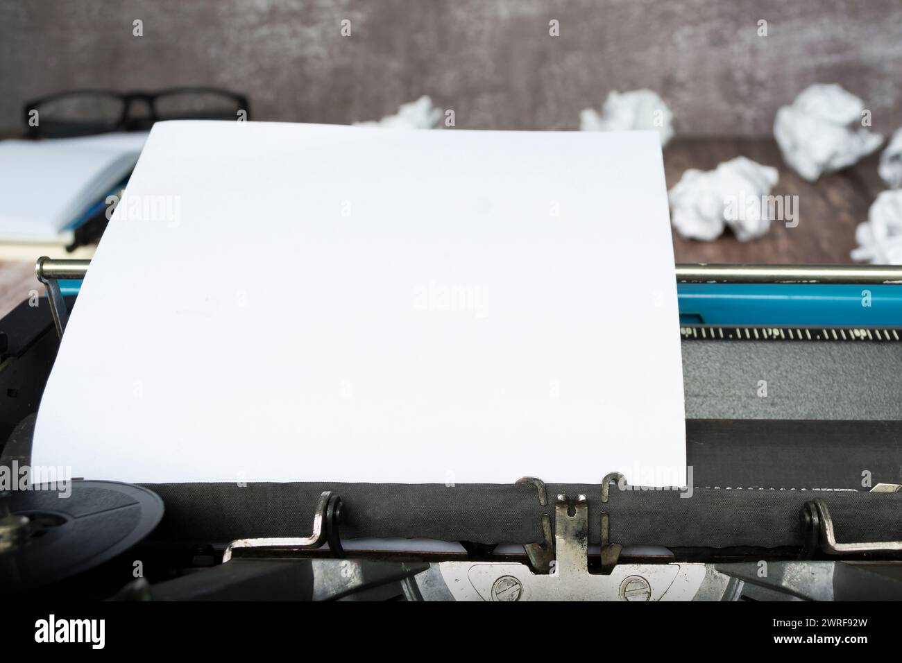 Blue typewriter with paper sheet. Space for your text Stock Photo - Alamy