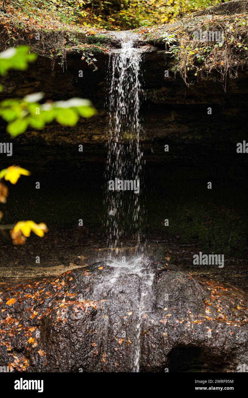 small incredibly beautiful and clean waterfall that flows next to a ...