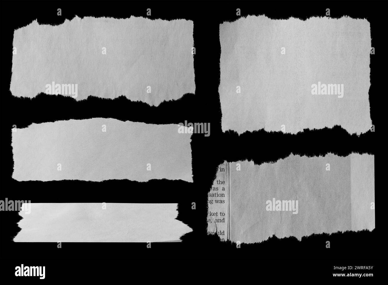 Five pieces of torn newspaper on black background Stock Photo - Alamy