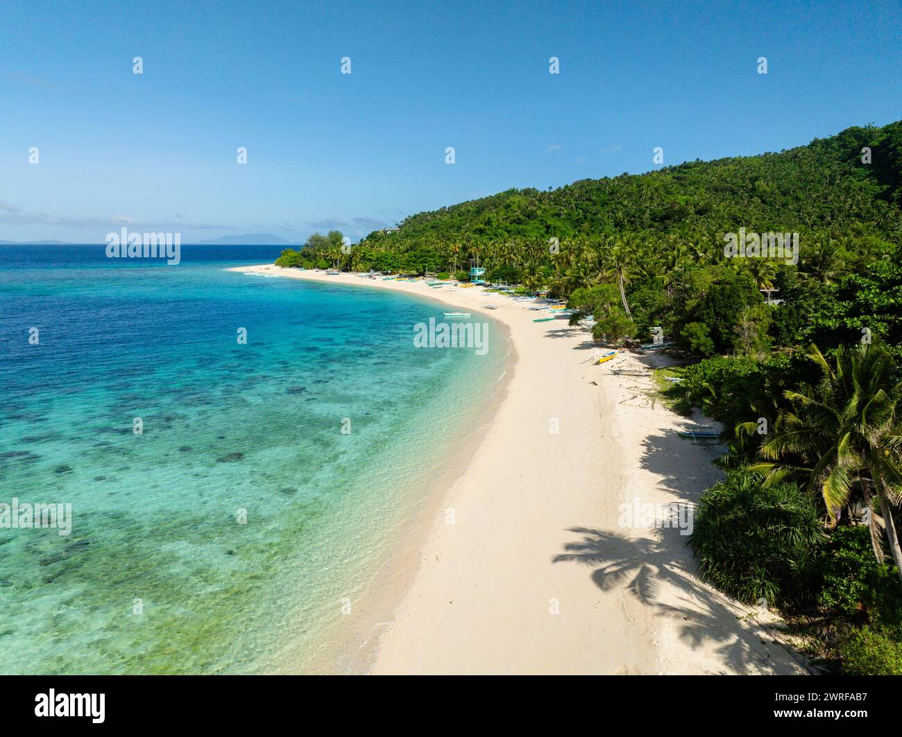 Beautiful white sand beach and crystal clear water. Cobrador Island ...