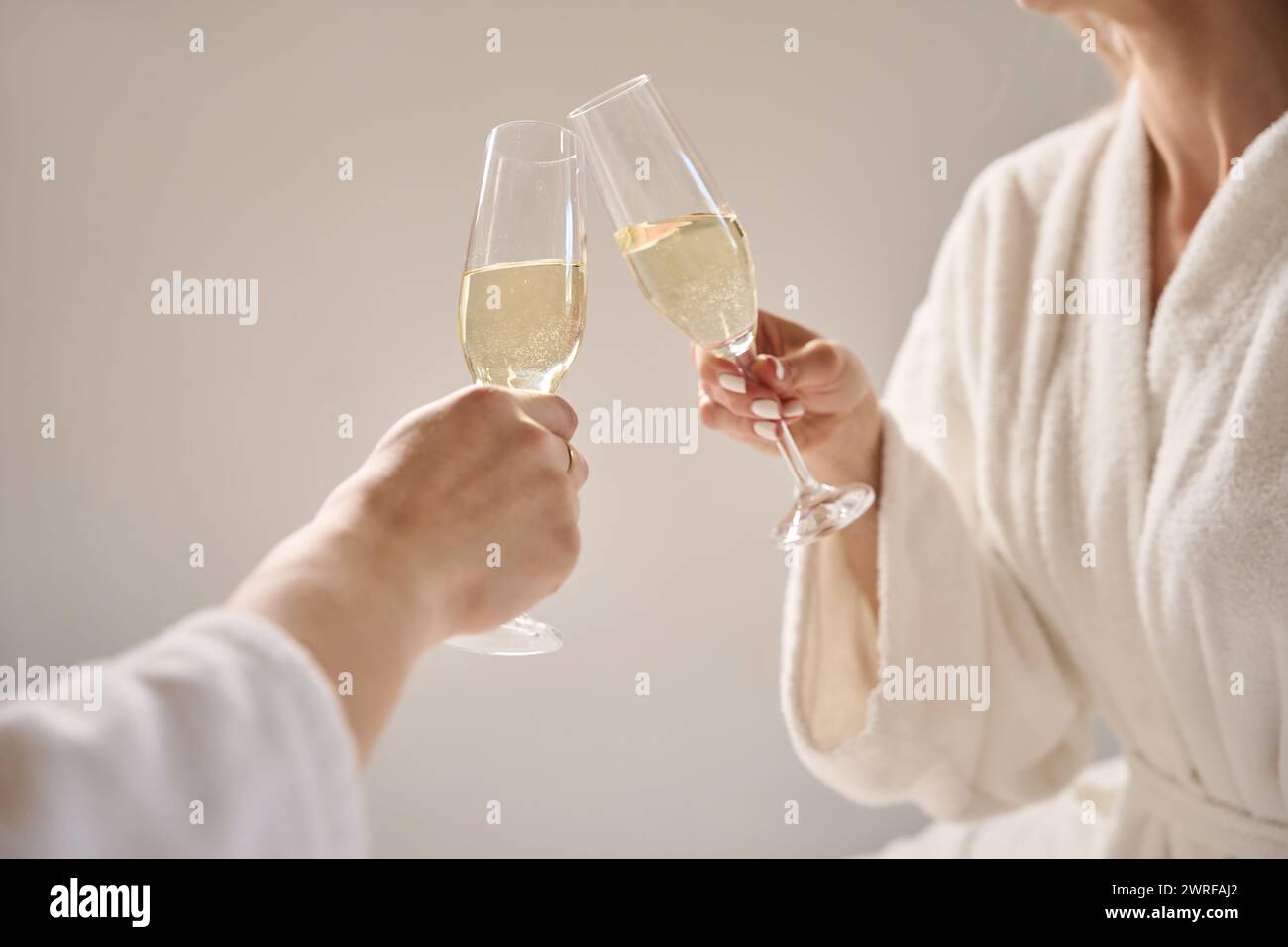 Couple in love with a glass of champagne Stock Photo - Alamy