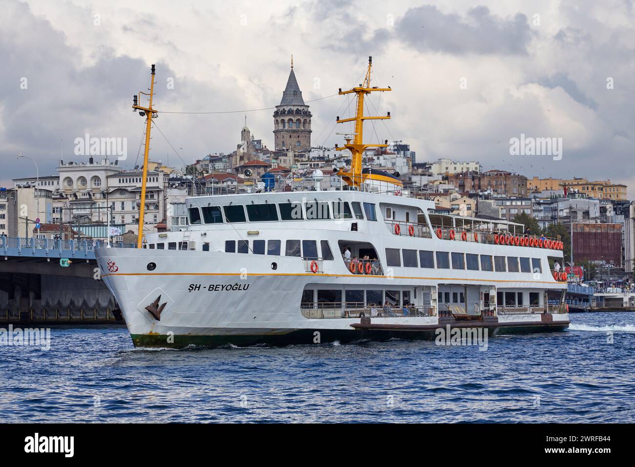 The Sh - Beyoglu Ferry approaching Eminonu harbour with the Galata ...