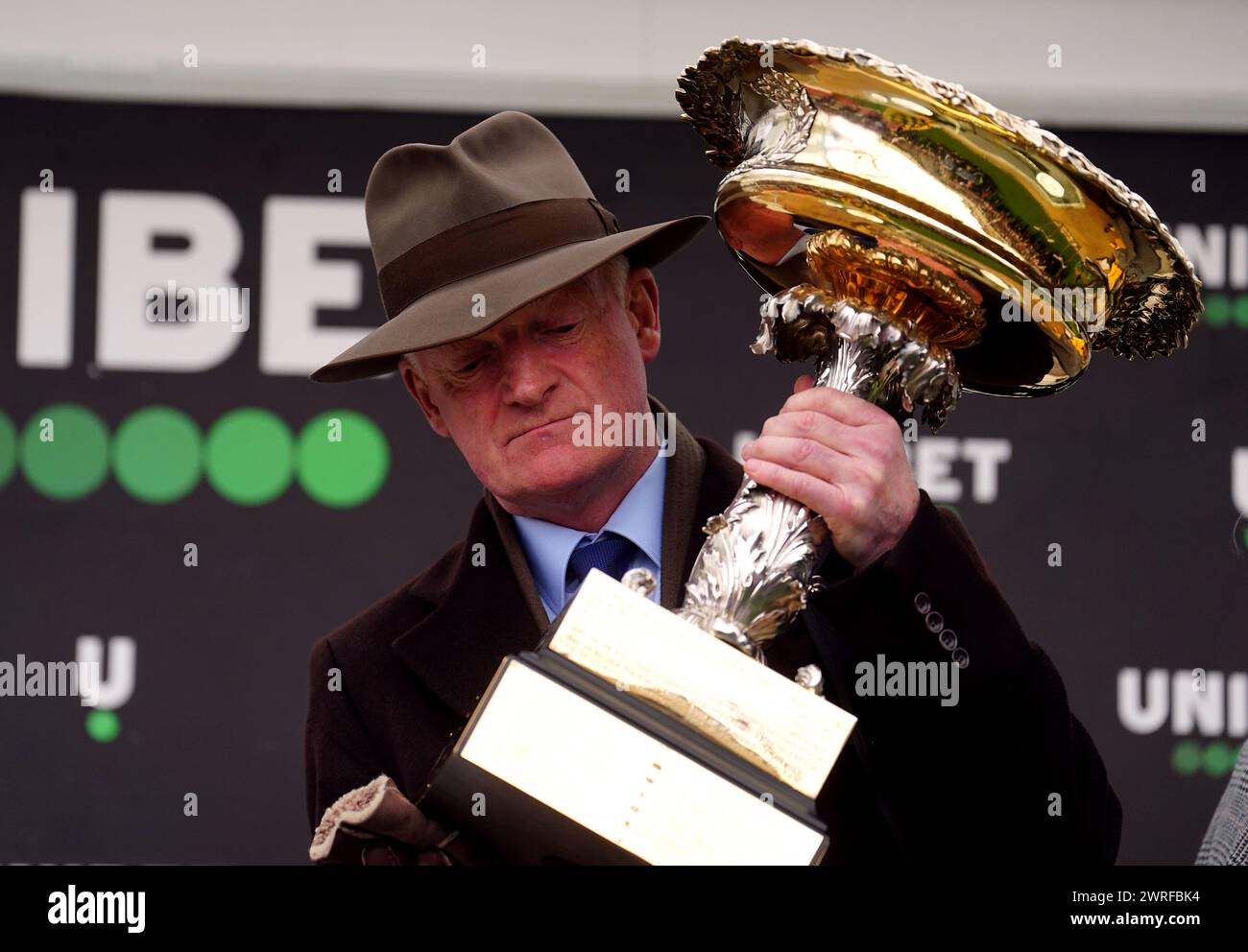 Trainer Willie Mullins with the trophy after winning the Unibet ...