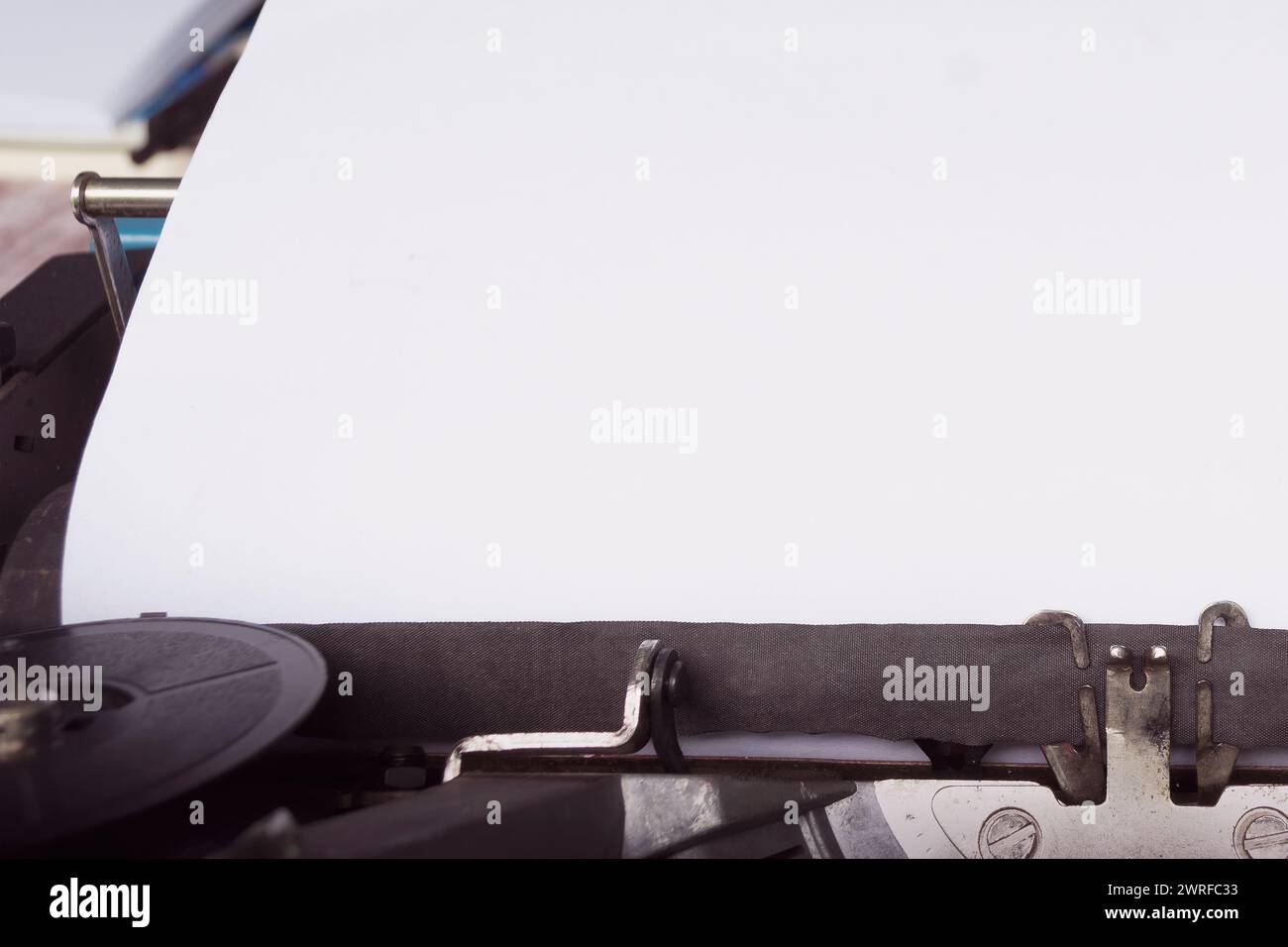 Blue typewriter with paper sheet. Space for your text Stock Photo - Alamy