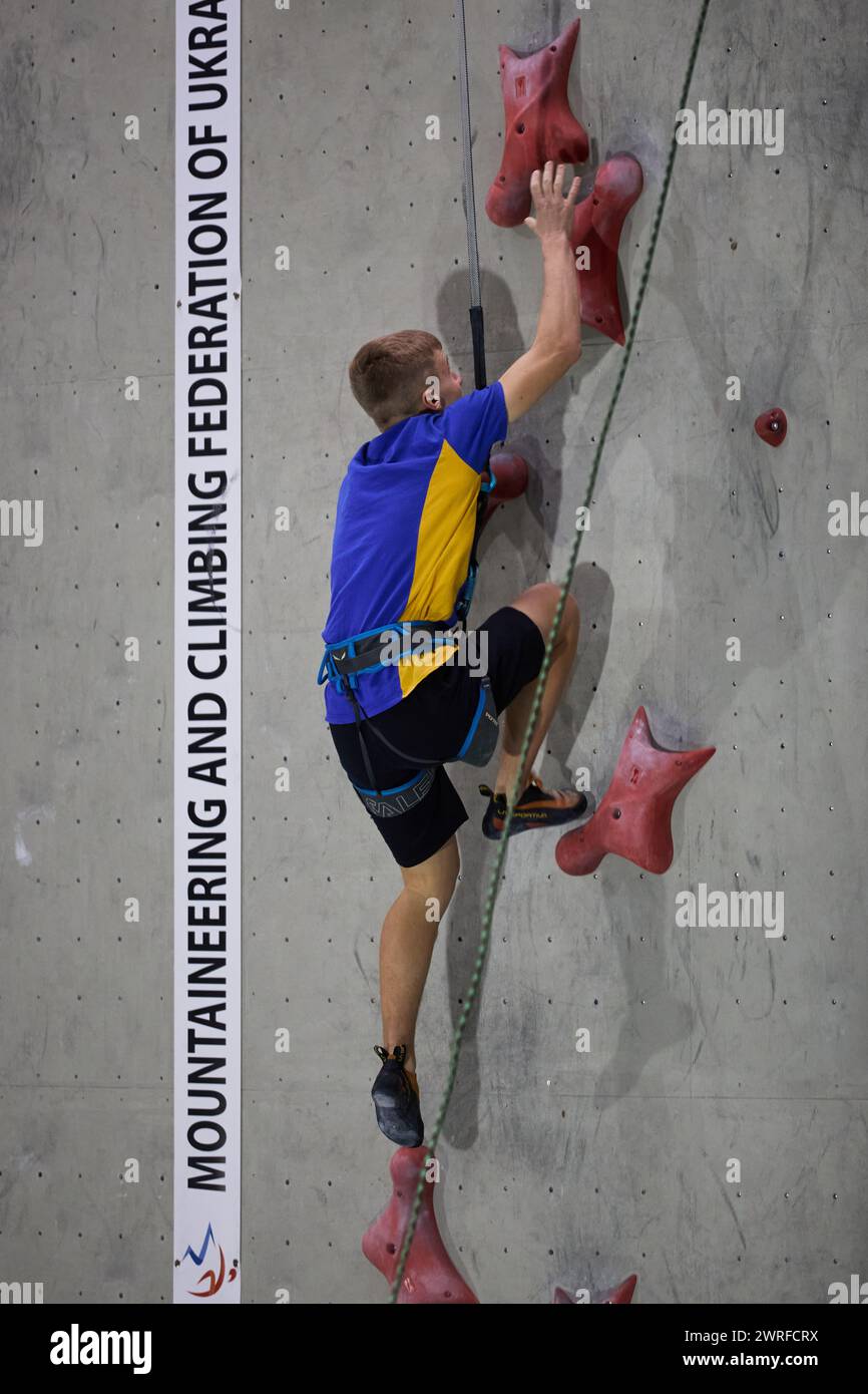 Young boy climbs on speed at competitive climbing event in Ukraine ...