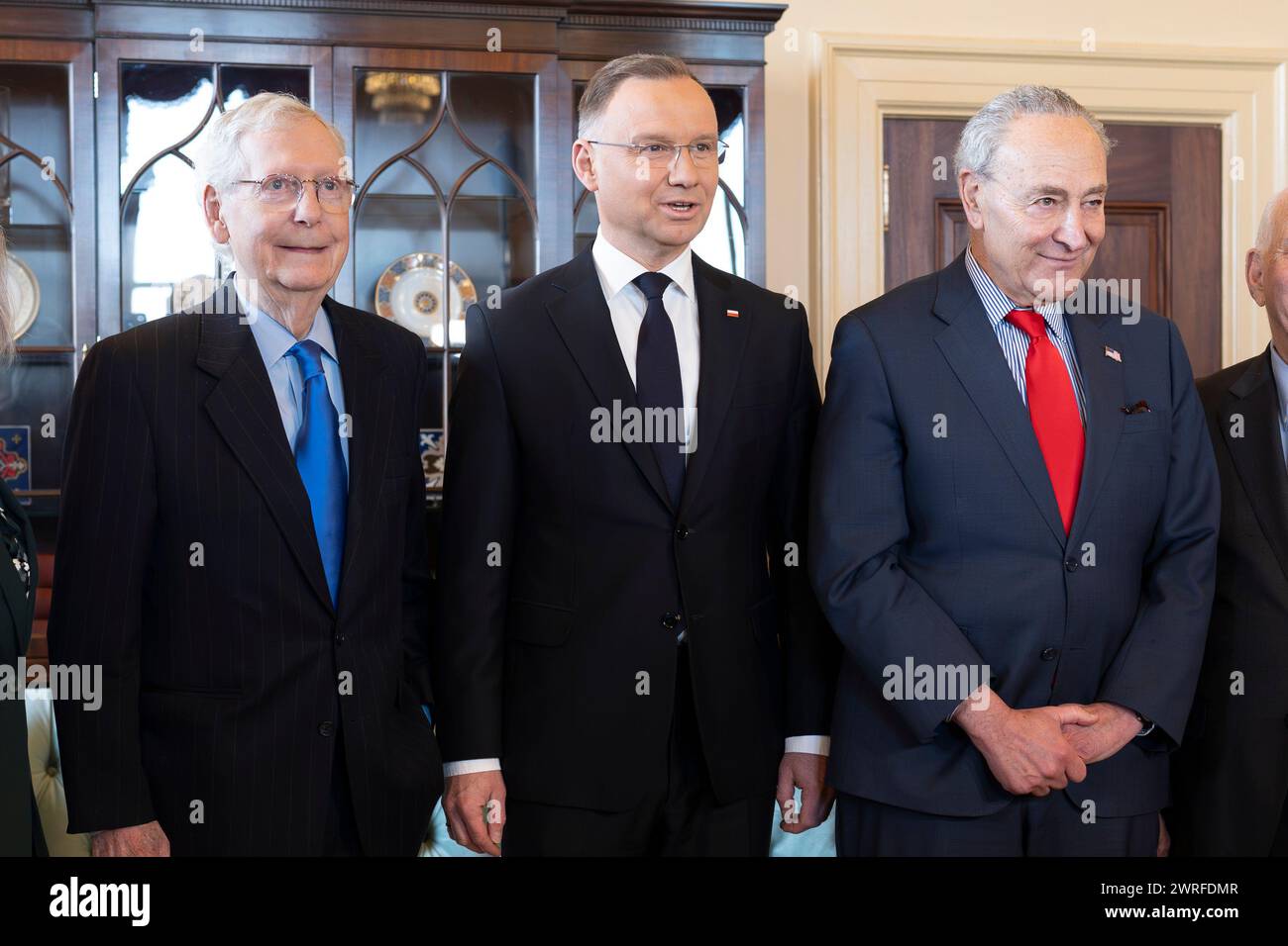 Polish President Andrzej Duda, center, is welcomed for talks with ...