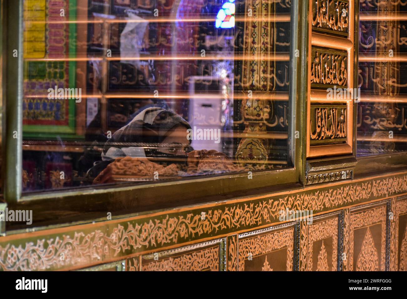 Srinagar, India. 12th Mar, 2024. A Kashmiri Muslim woman prays inside ...