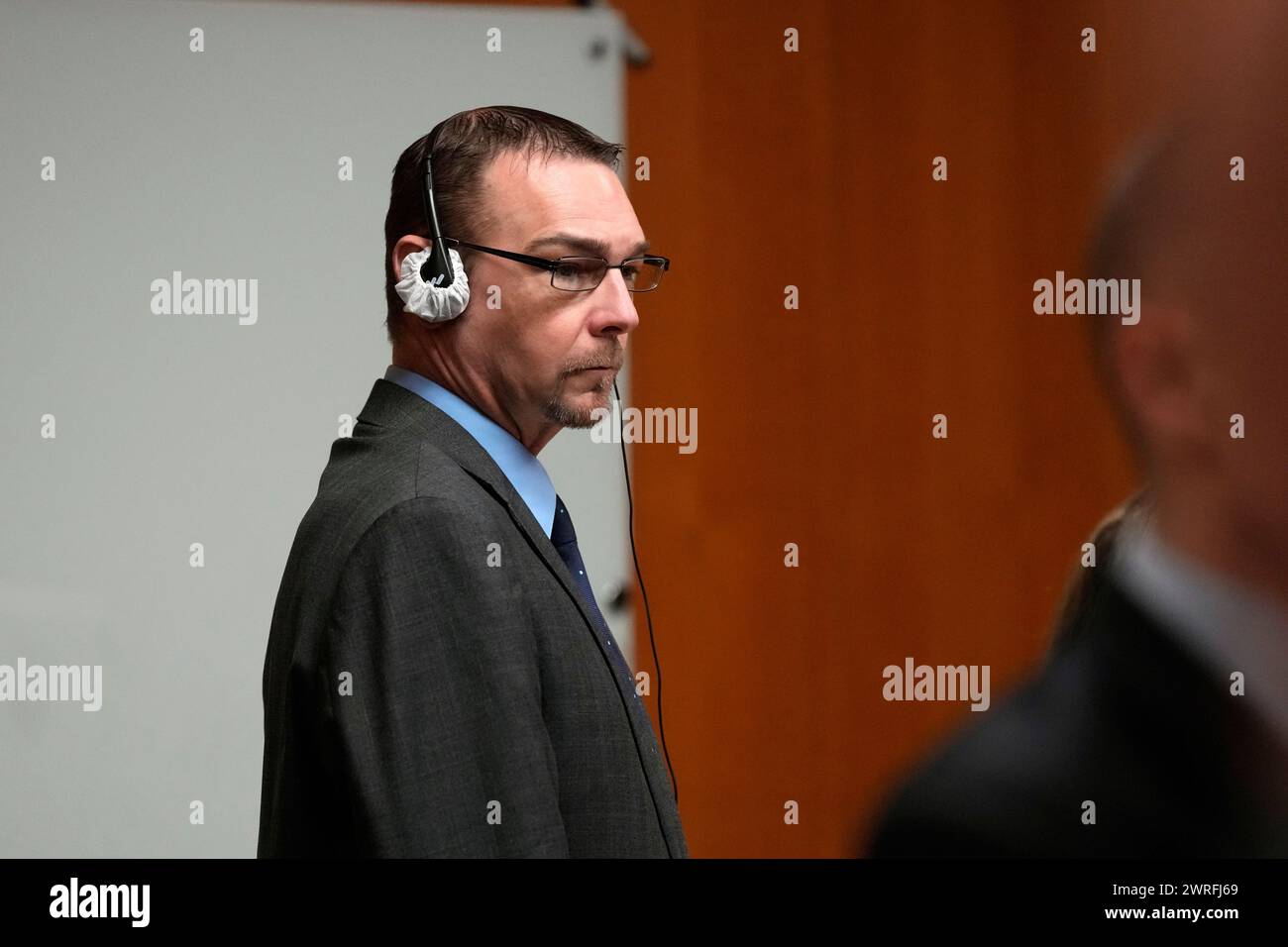 James Crumbley, the father of a Michigan school shooter stands during ...
