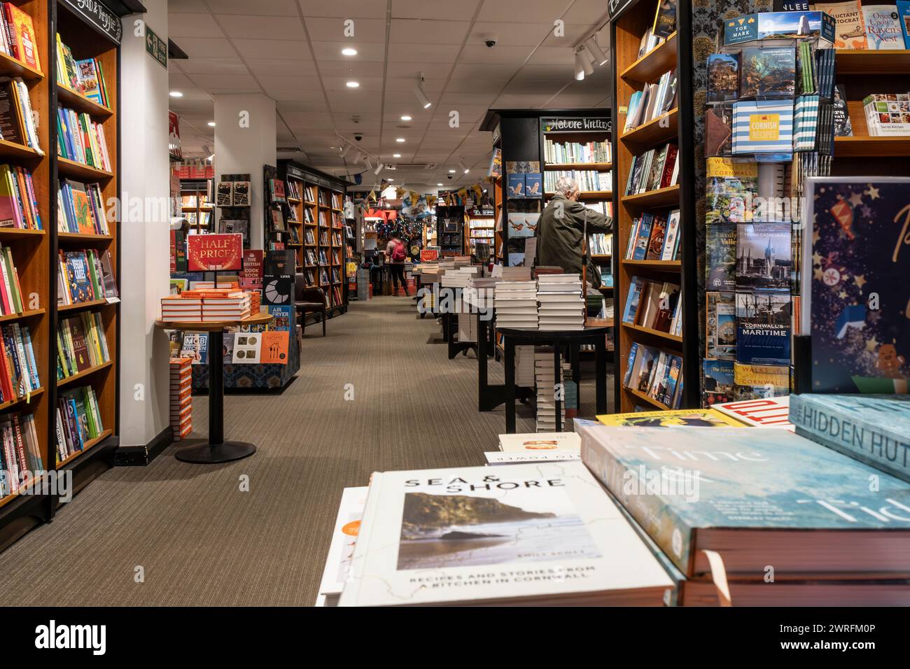 Shoppers browsing inside a Waterstones bookshop in the UK Stock Photo ...