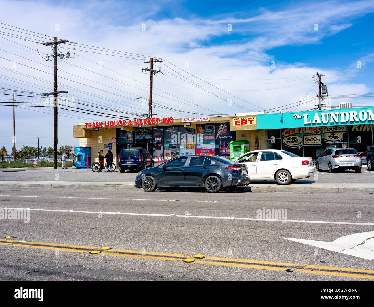Liquor store and laundromat, strip mall, Southern California Stock ...