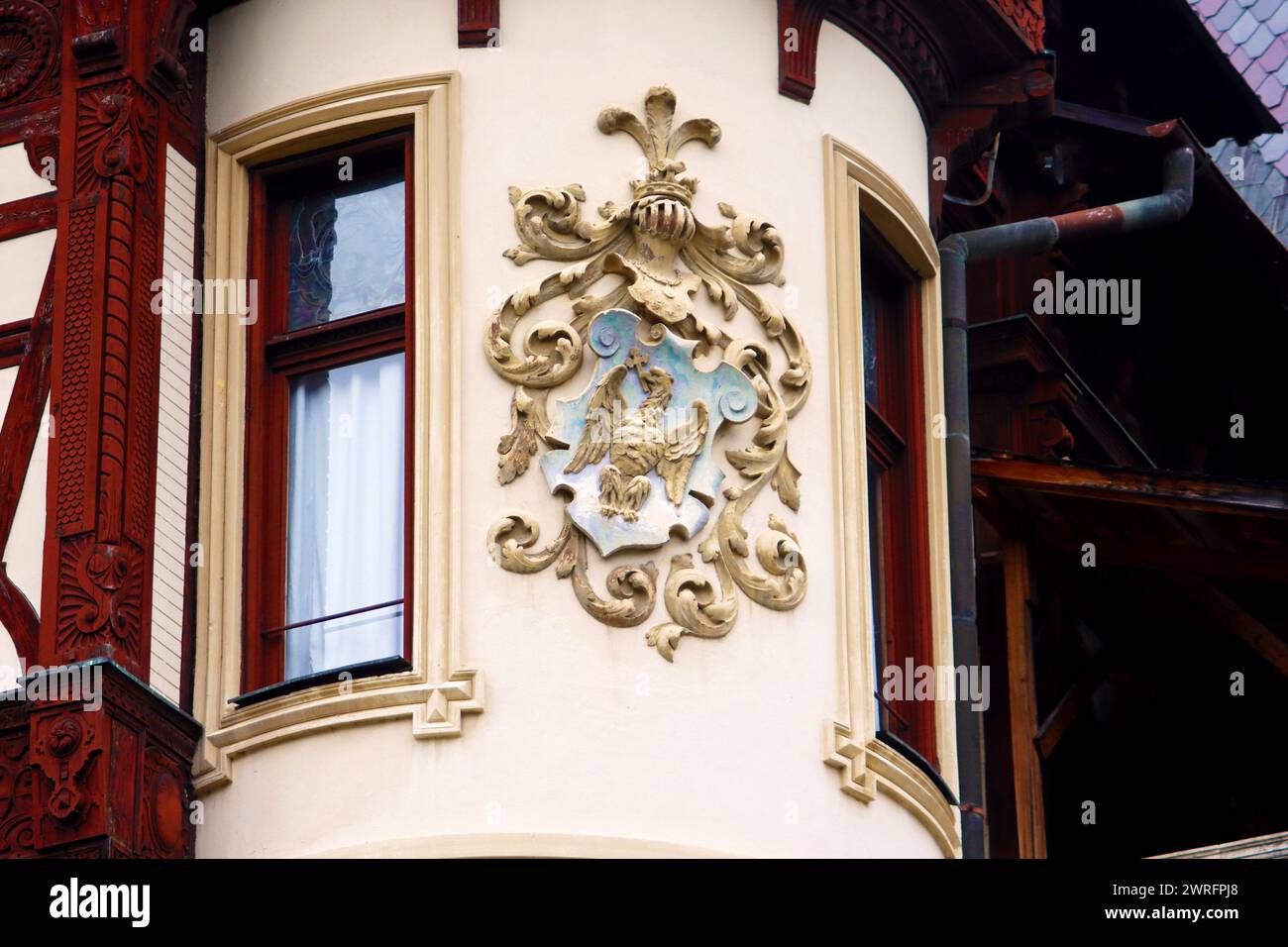 The beautiful Peles Castle, Sinaia, Romania. Coat of arms Stock Photo ...