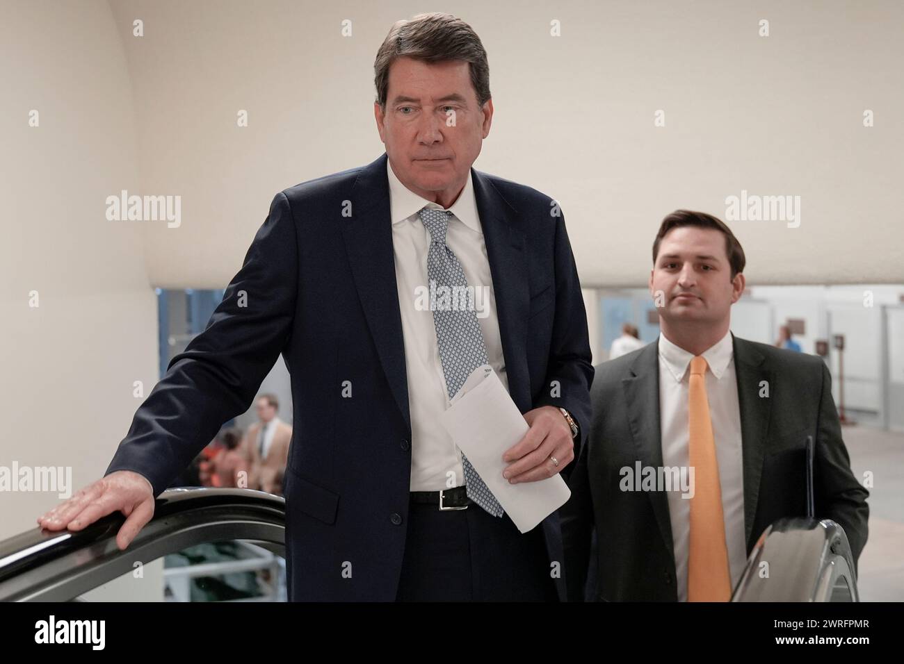 Sen. Bill Hagerty, R-Tenn., left, is seen at the Senate subway on ...
