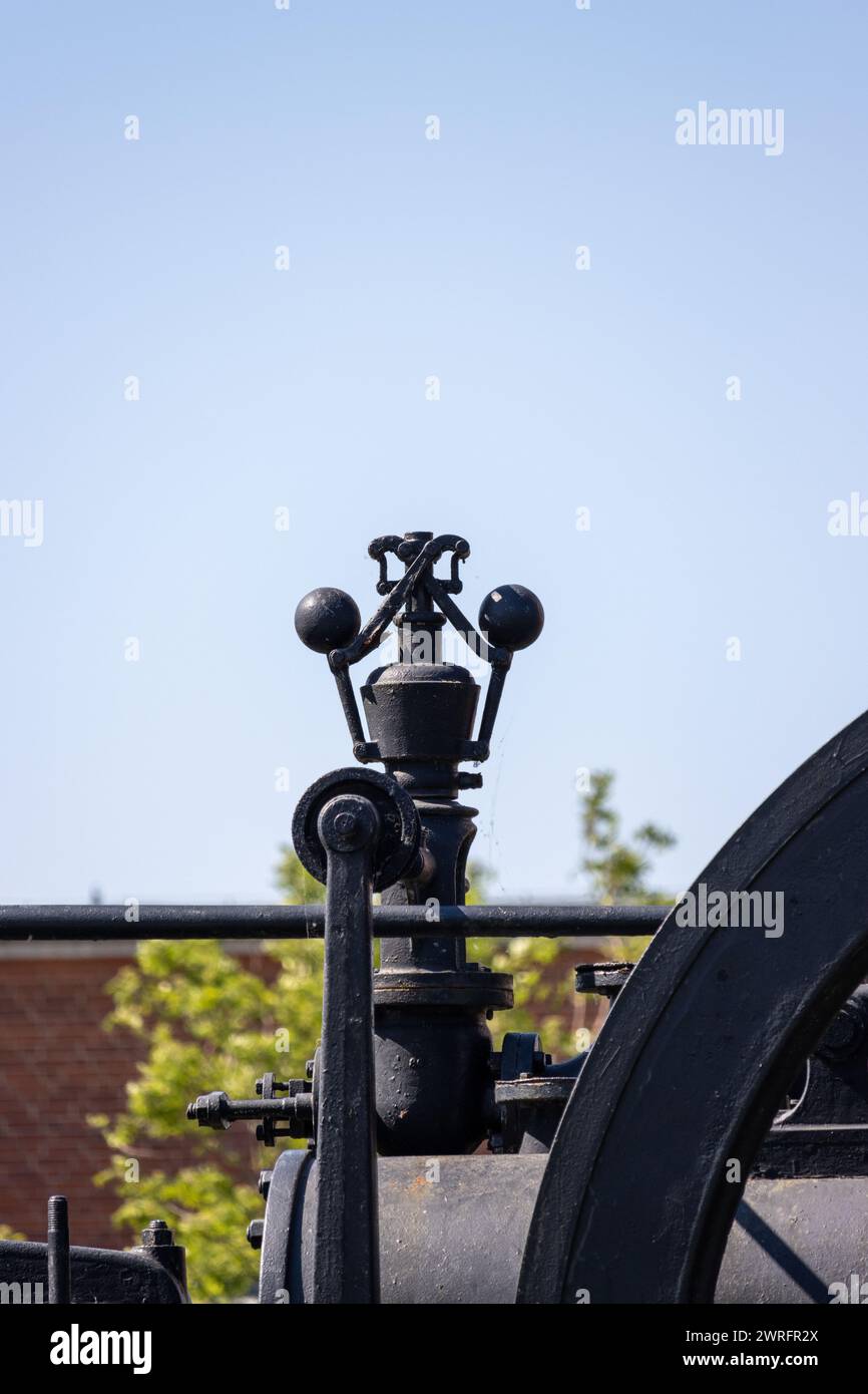 Black metal pressure release on old steam generator Stock Photo - Alamy