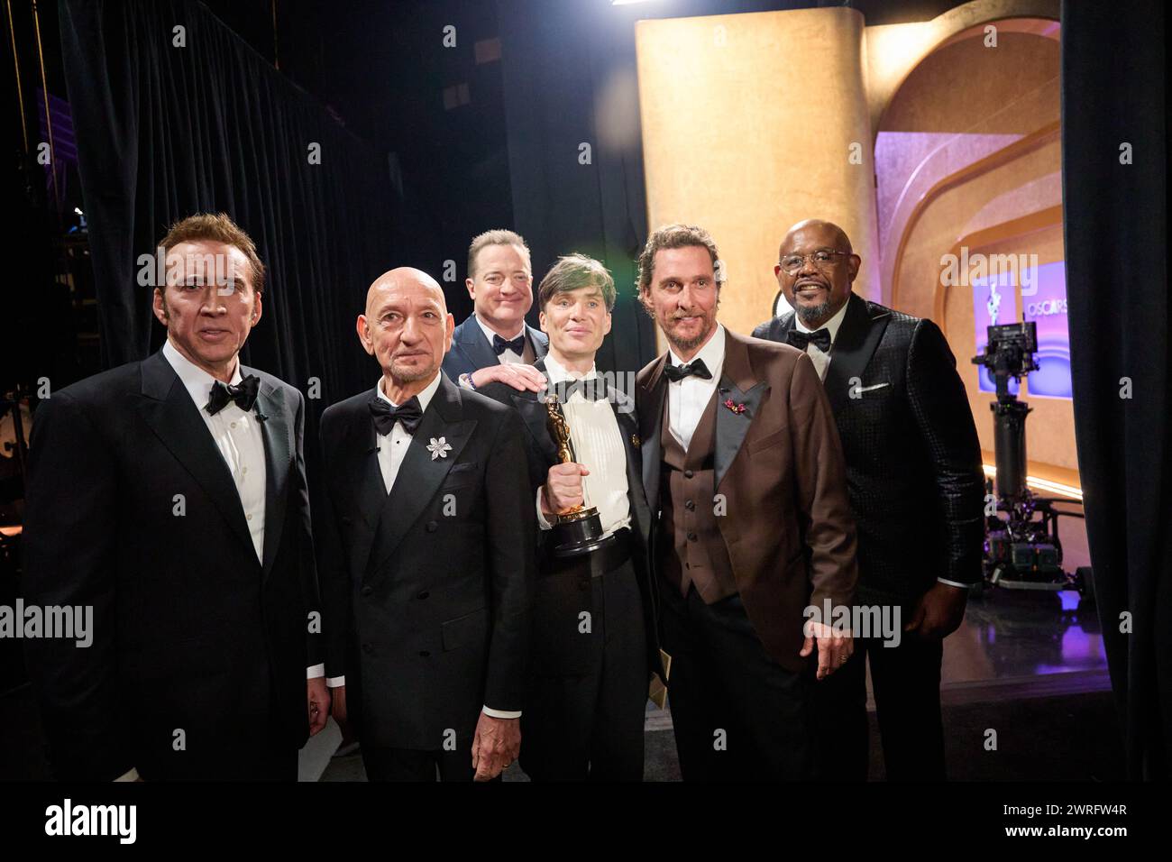 Los Angeles, USA. 10th Mar, 2024. Cillian Murphy (C) backstage with the ...