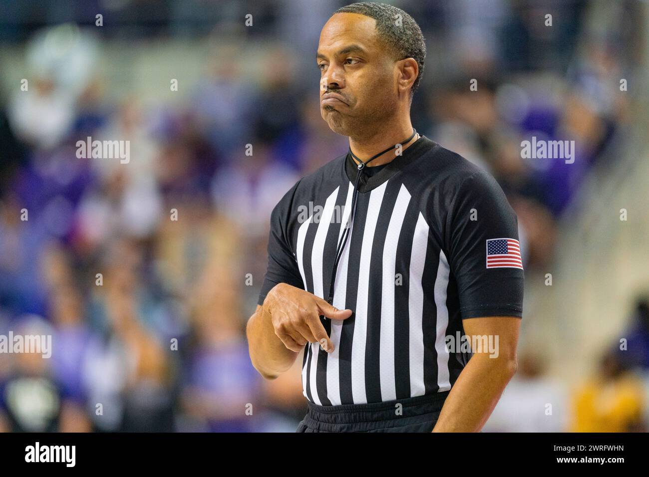 FORT WORTH, TX - MARCH 09:Referee Marques Pettigrew makes a face during ...